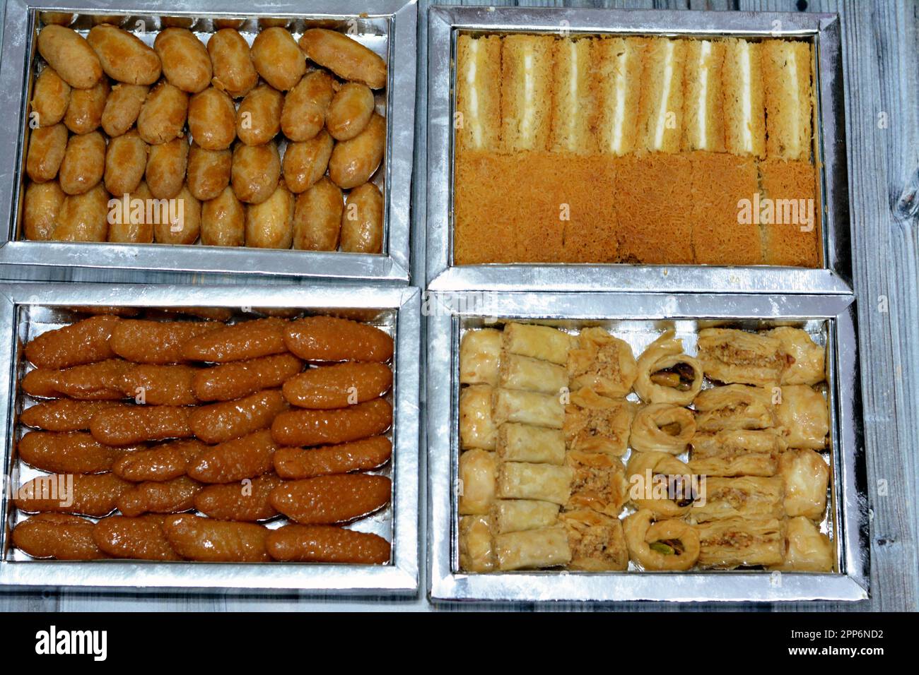 Different types of Eastern sweets of Baklava covered and stuffed with ...