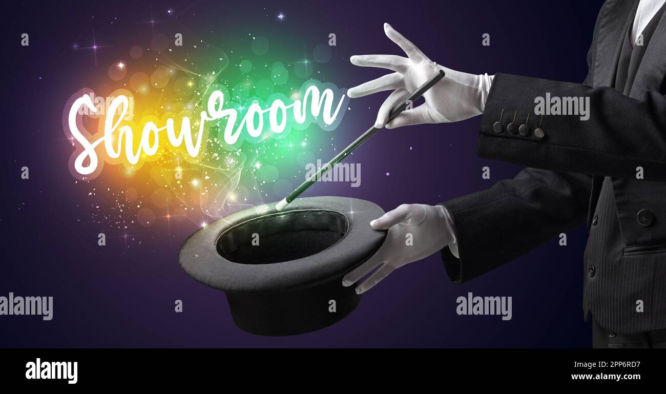 Young magician is showing magic trick Stock Photo - Alamy
