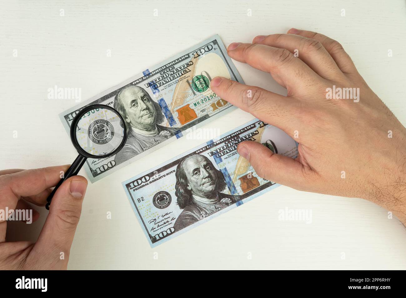 Counterfeiter forges banknotes. Fake concept. Fake money American ...