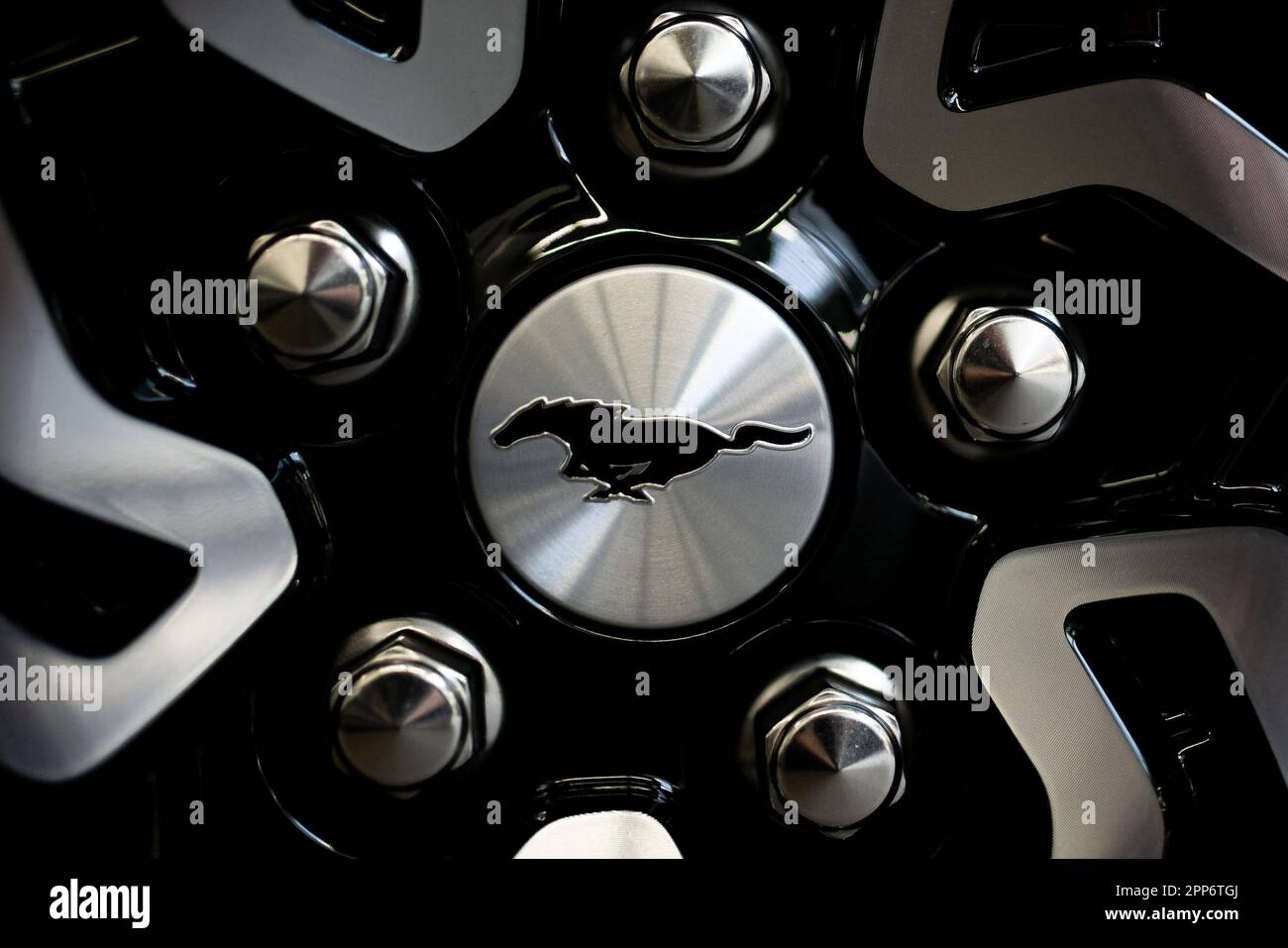 In this photo illustration, a Ford Mustang logo seen displayed on an ...