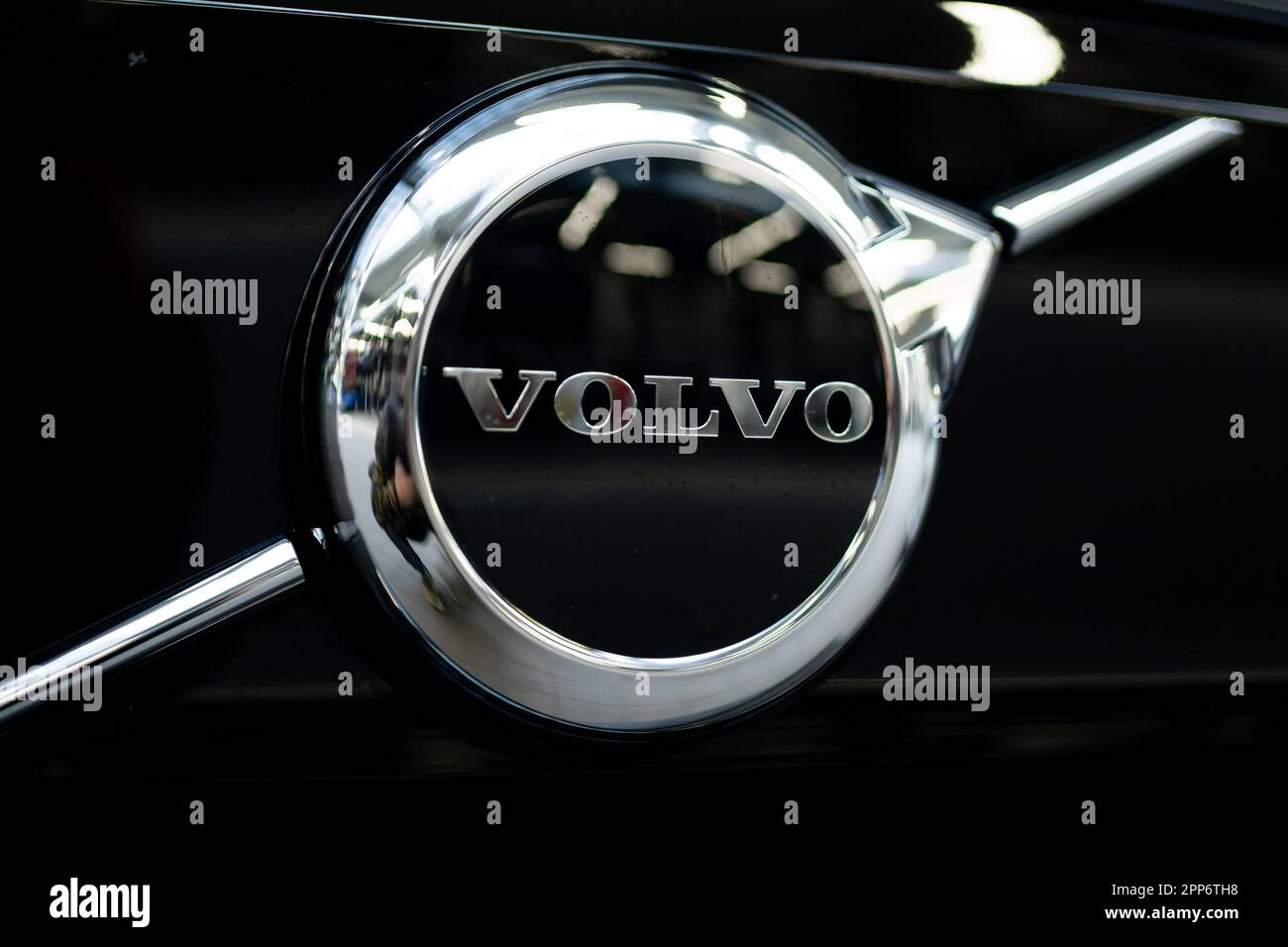 In this photo illustration, a Volvo logo seen displayed on an electric ...