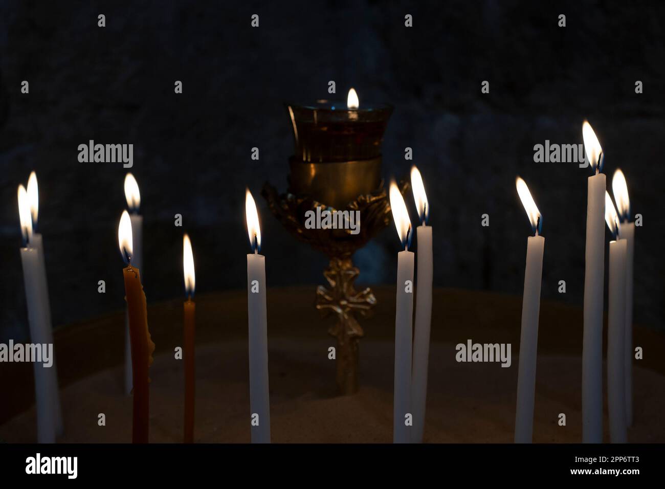 Many lit candles in orthodox hi-res stock photography and images - Alamy
