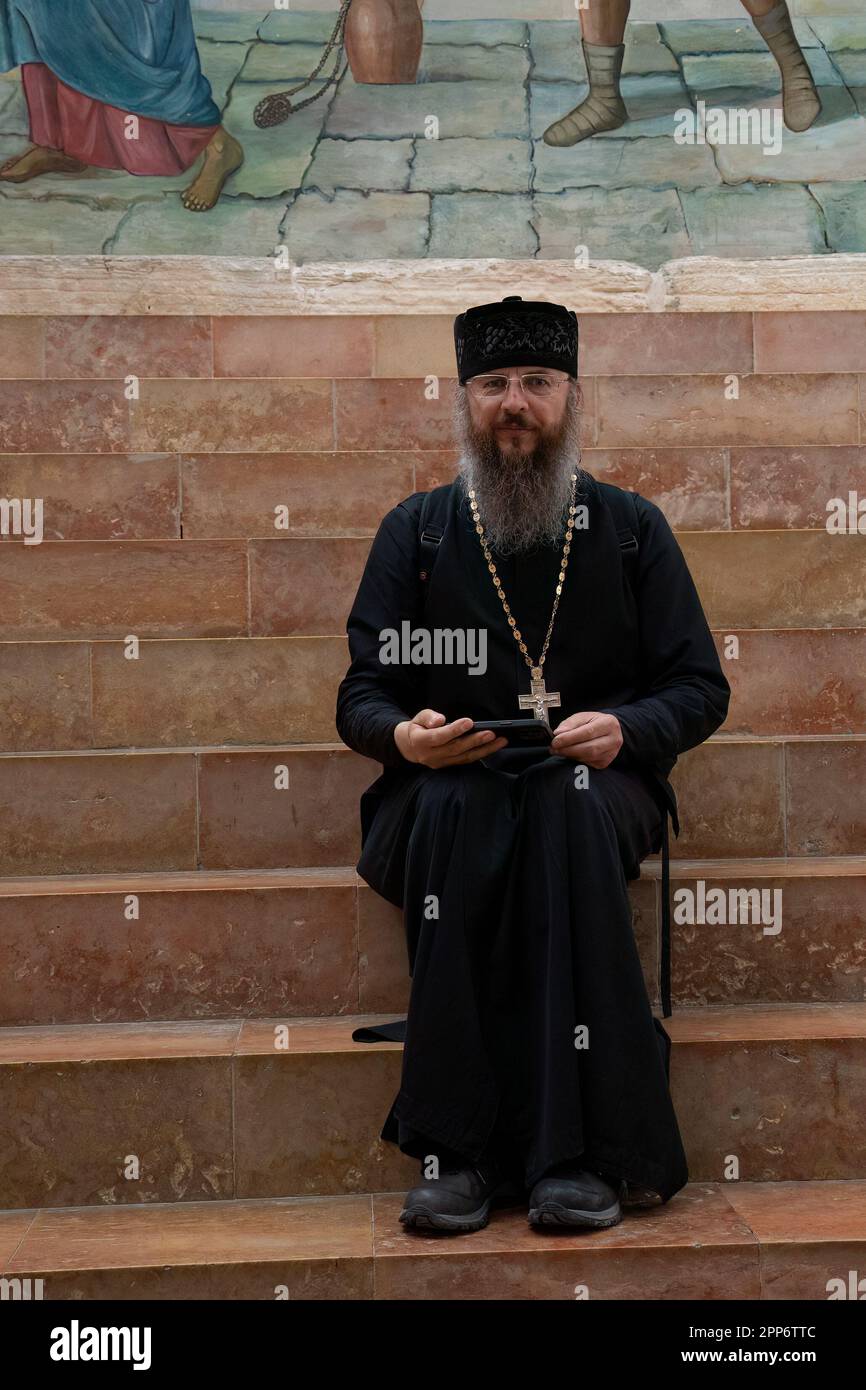 Jerusalem, Israel - November 12th, 2022:A russian orthodox priest ...