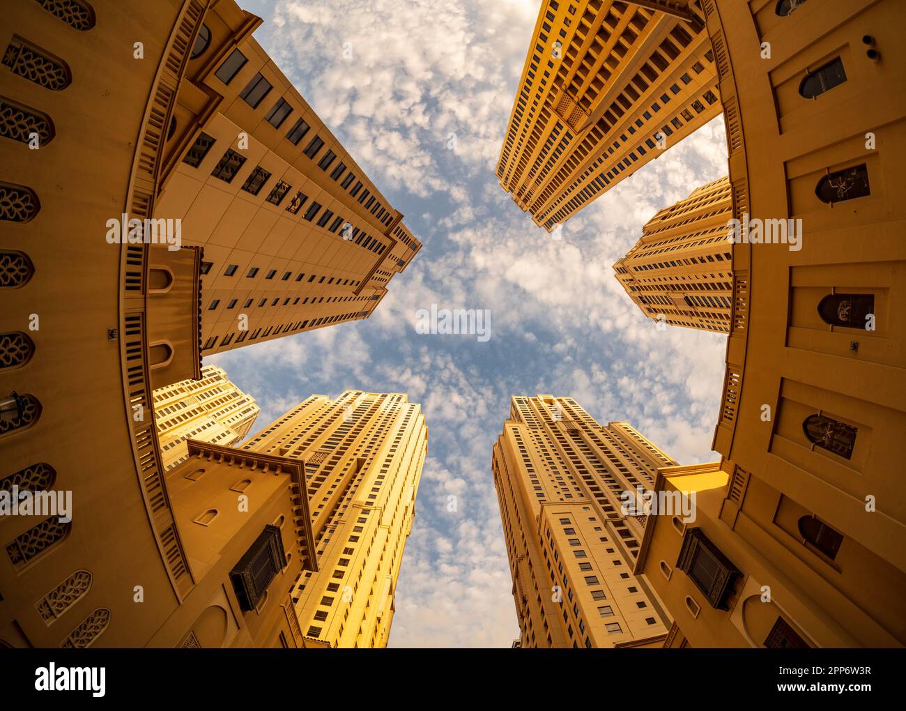 View up to sky with fisheye lens of the hotel towers at JBR Beach in ...