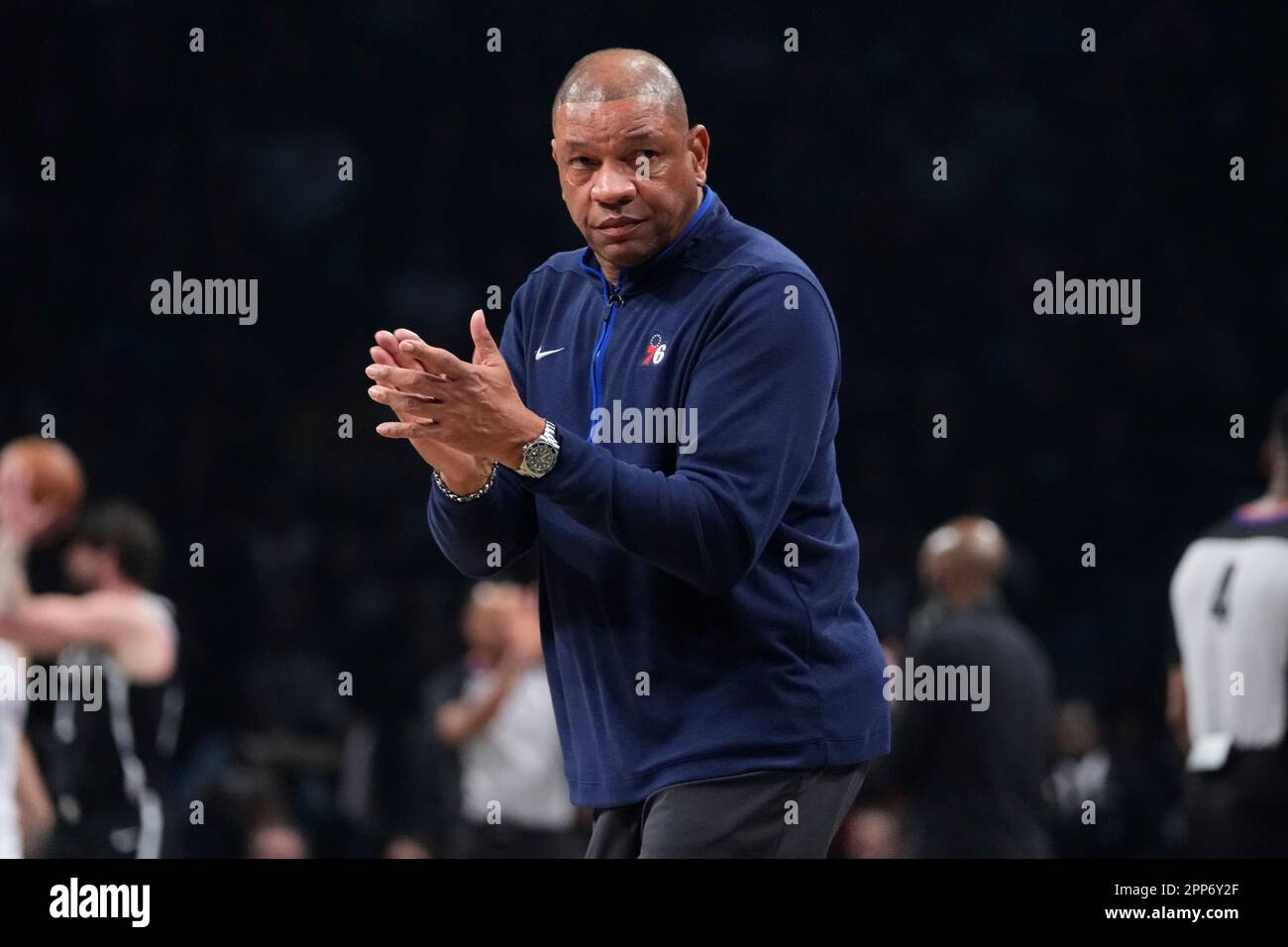 Philadelphia 76ers head coach Doc Rivers claps during the first half of ...
