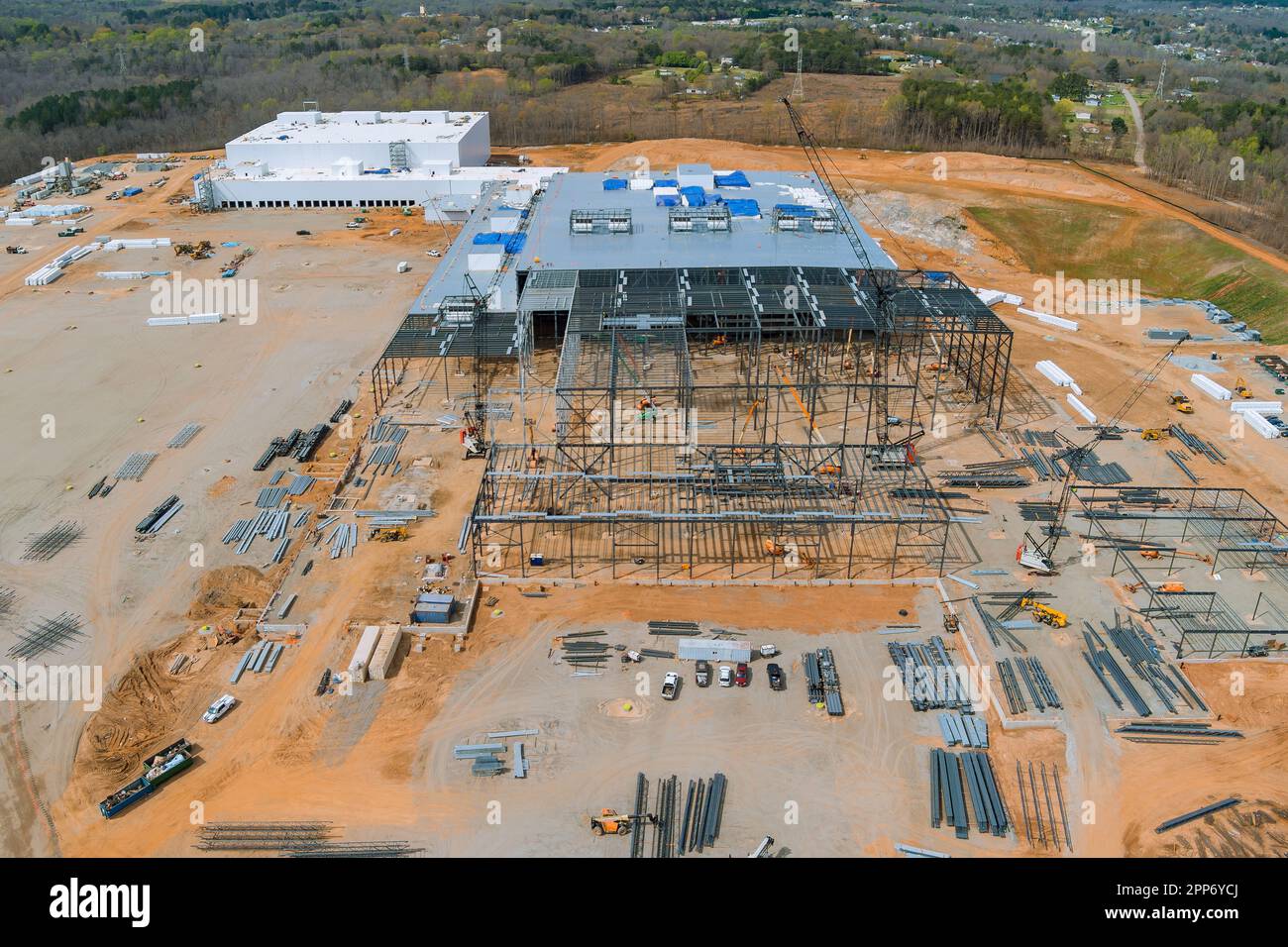Installation of metal construction frame for steel warehouse work on ...