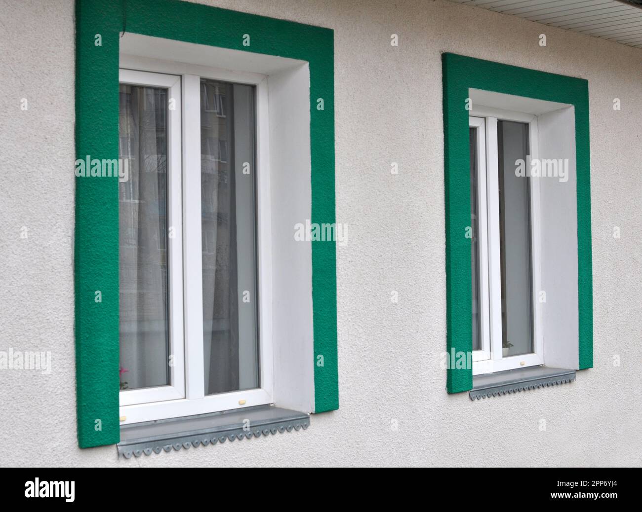 View and design of a metal-plastic window from the outside Stock Photo - Alamy