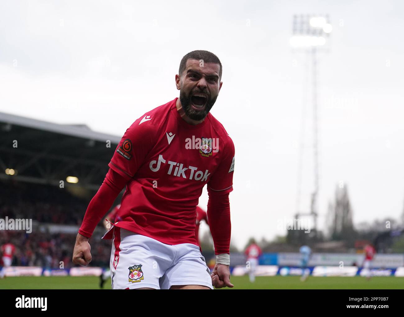 Wrexham's Elliott Lee celebrates scoring their side's first goal of the ...