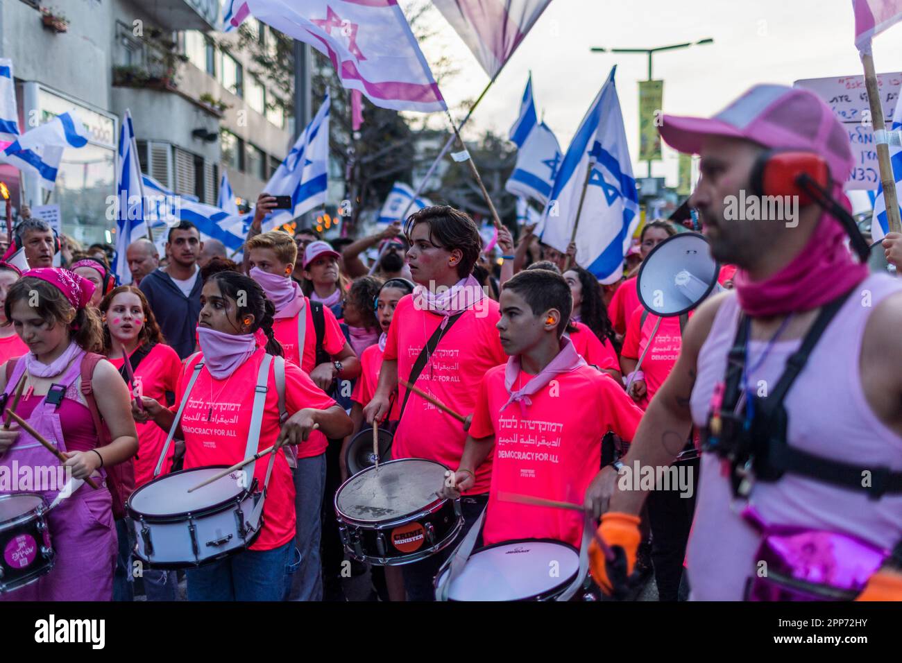 Tel Aviv, Israel. 22nd Apr, 2023. Demonstrators wave flags and play ...