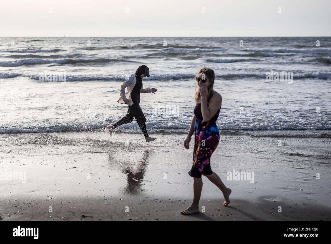 Tel Aviv, Israel. 22nd Apr, 2023. People walk along the Jaffo beach ...