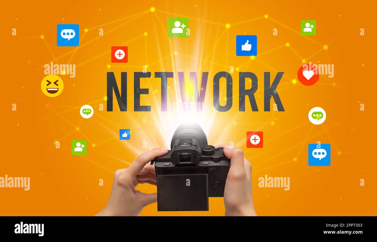 Using camera to capture social media content Stock Photo - Alamy