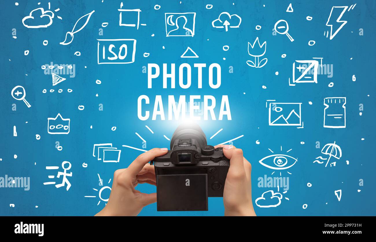 Hand taking picture with digital camera Stock Photo - Alamy