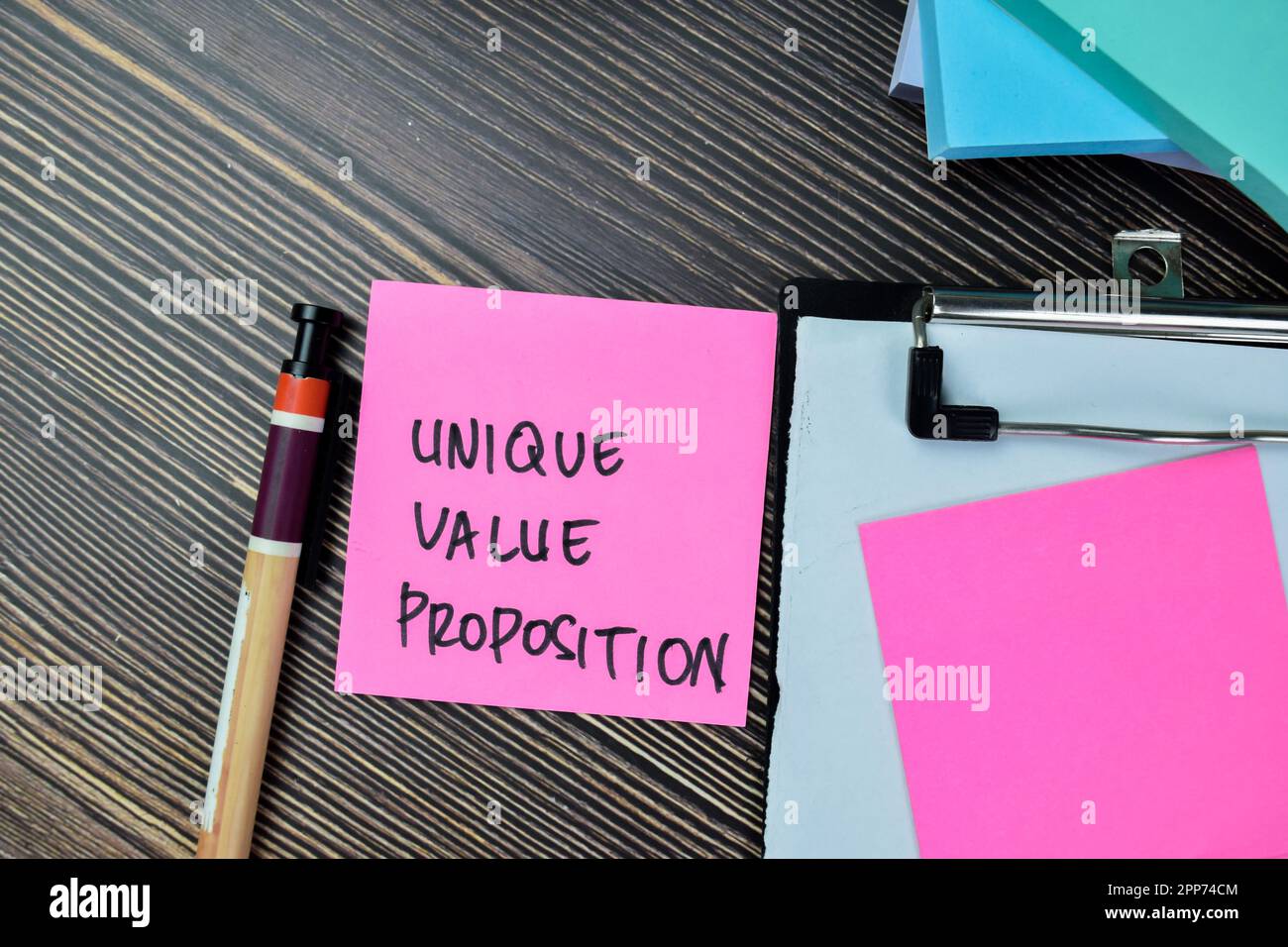 Concept of Unique Value Proposition write on sticky notes isolated on ...