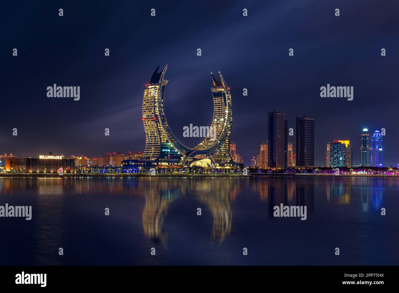Katara buildings view from Lusail Marina Park. Crescent Tower Stock ...