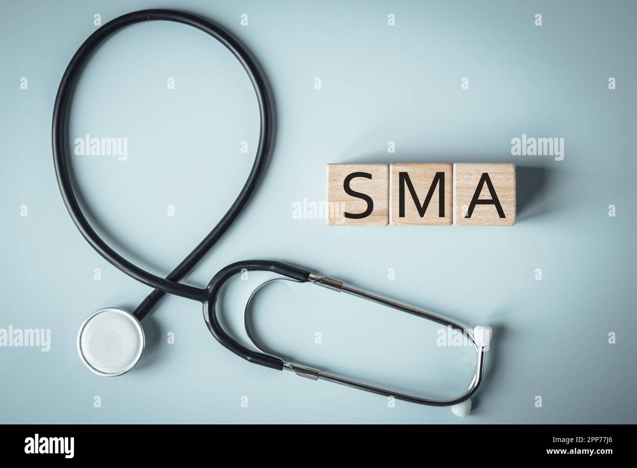 SMA, spinal muscular atrophy, Written on wooden blocks, a rare disease ...