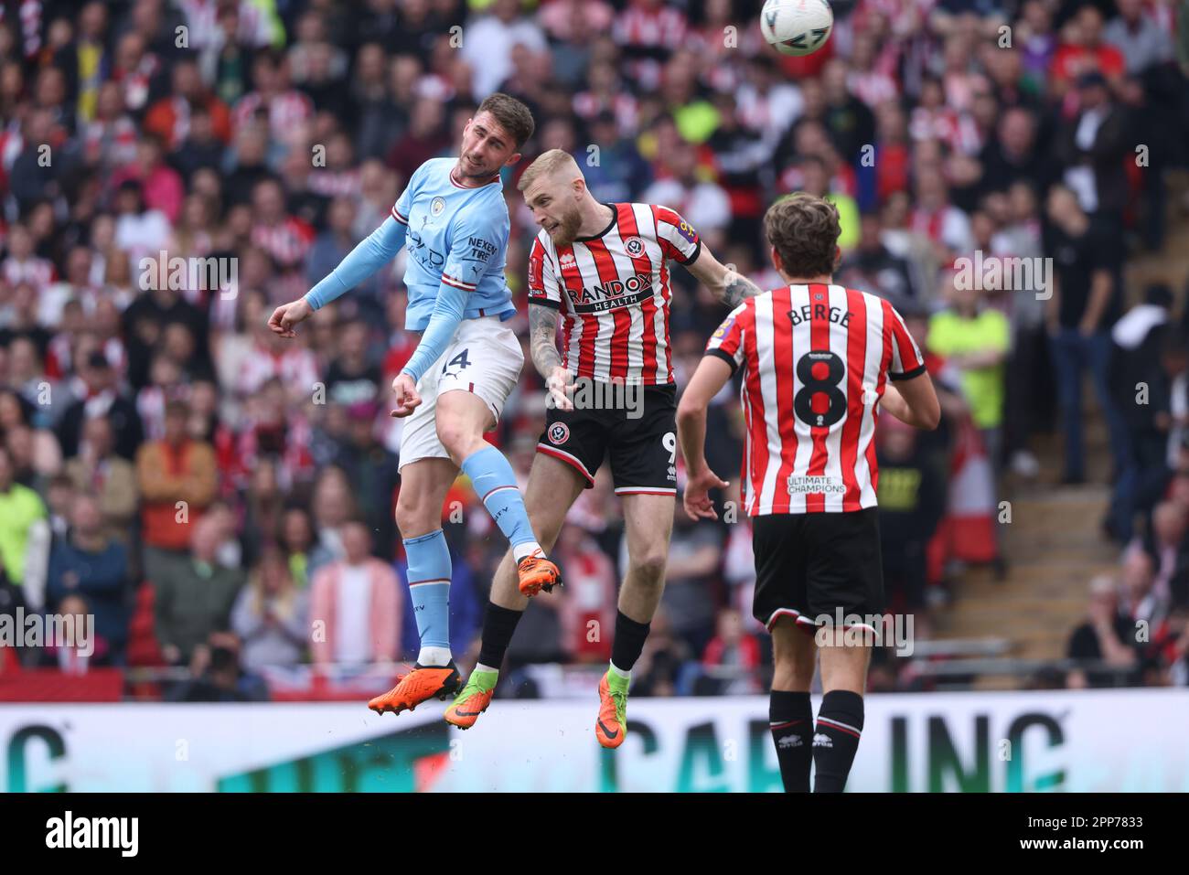 London, UK. 22nd Apr, 2023. Aymeric Laporte (MC) Oliver McBurnie (SU ...