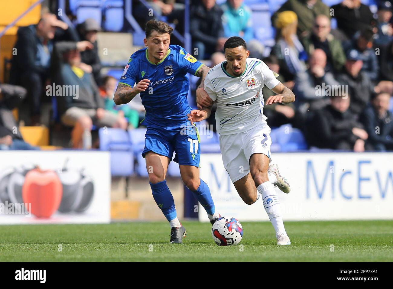 Birkenhead, UK. 22nd Apr, 2023. Otis Khan of Grimsby Town (l) and Josh ...