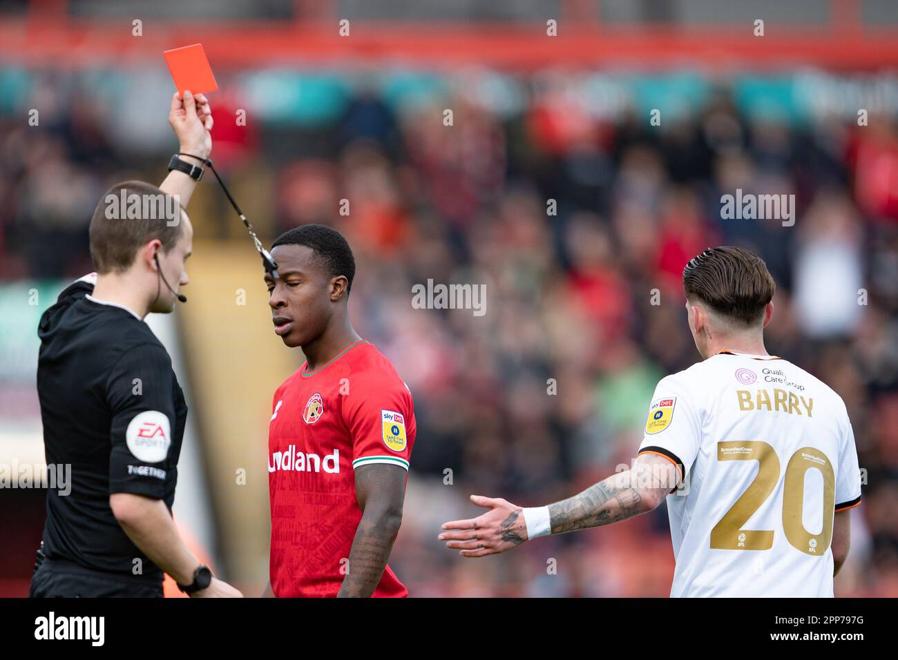 Walsall, UK. 22nd April 2023Referee Andrew Kitchen shows the red card ...