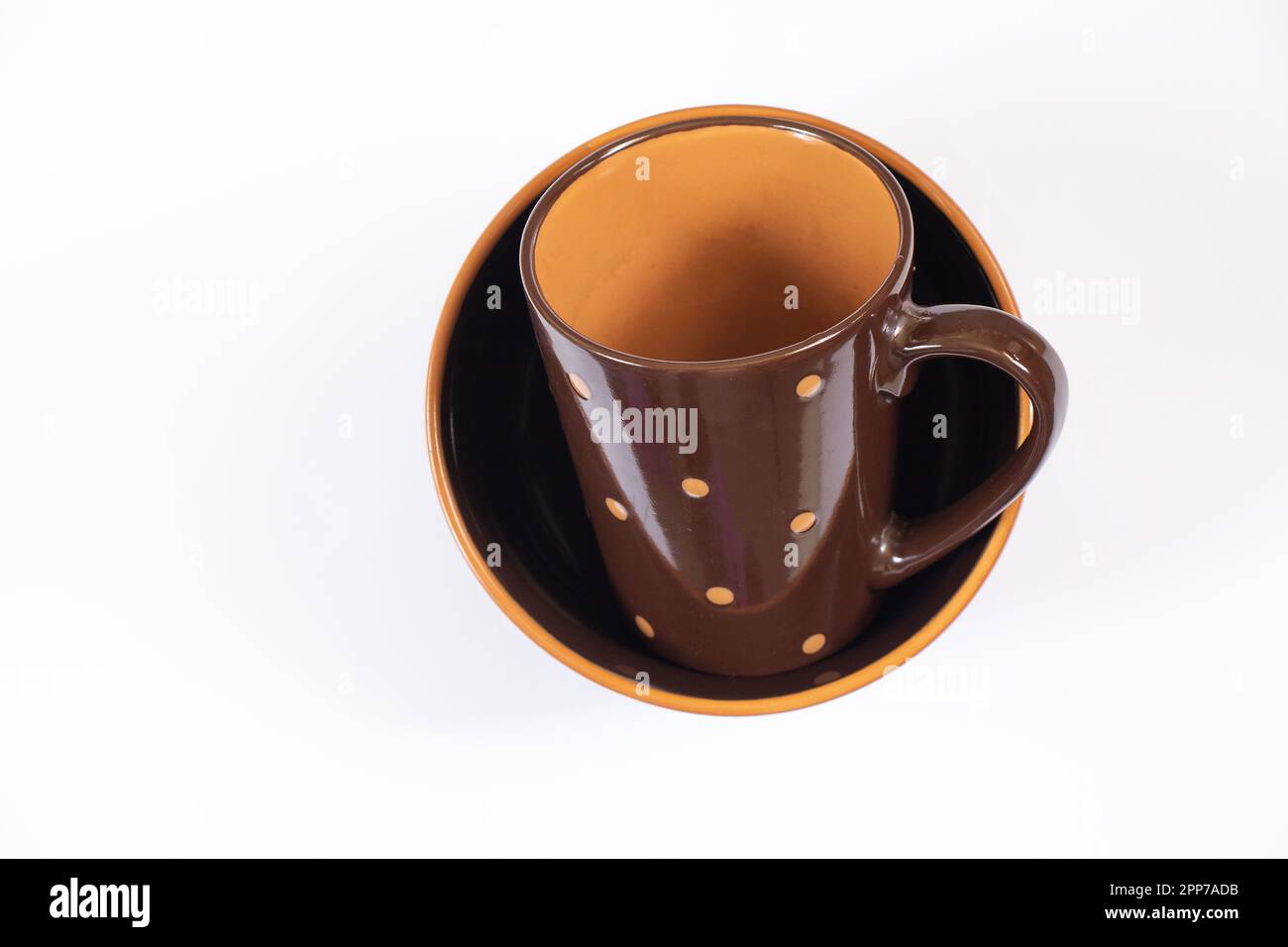 set of identical cups and a plate on an isolated background Stock Photo ...