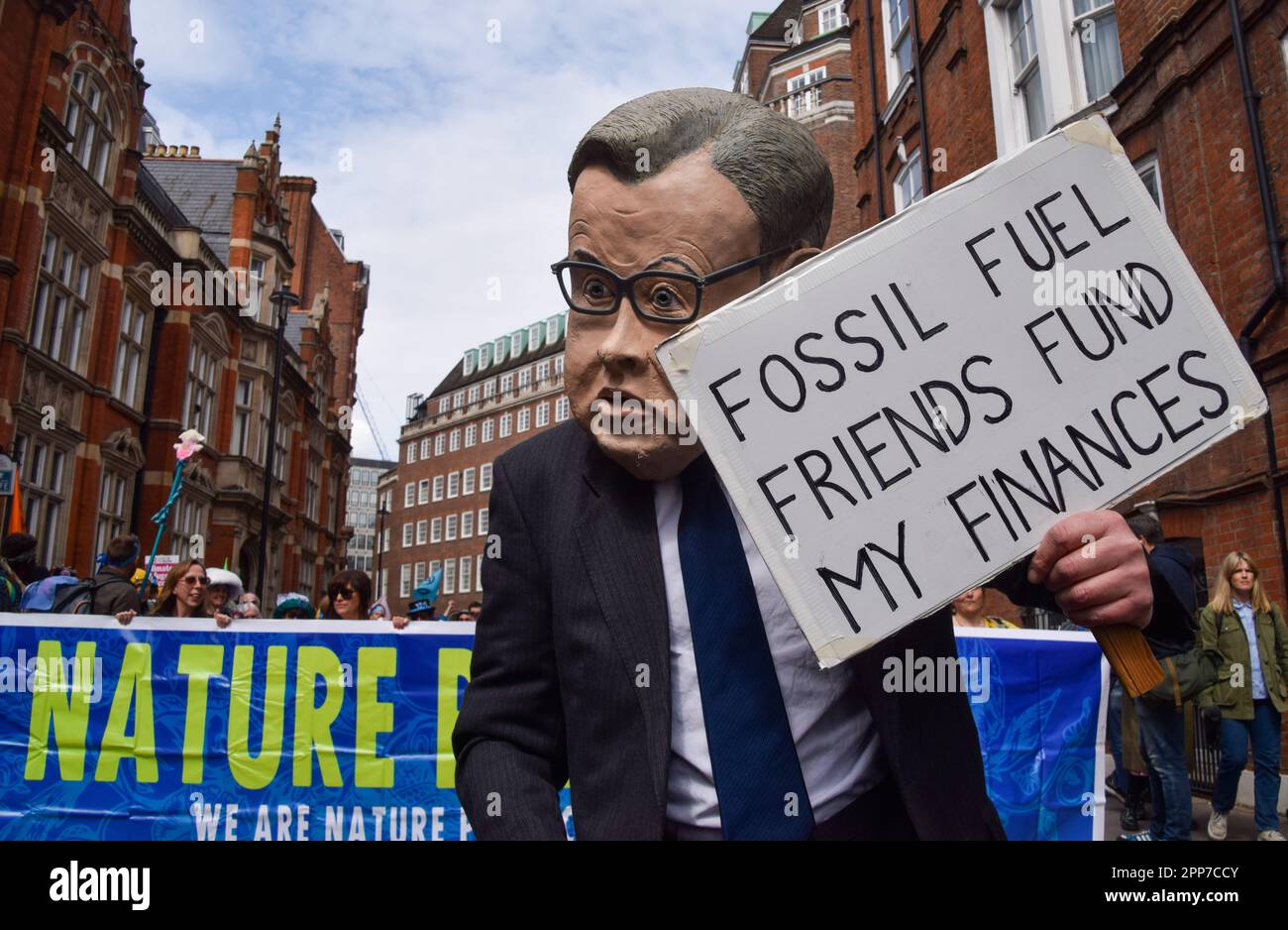 London, England, UK. 22nd Apr, 2023. A protester wears a Michael Gove ...