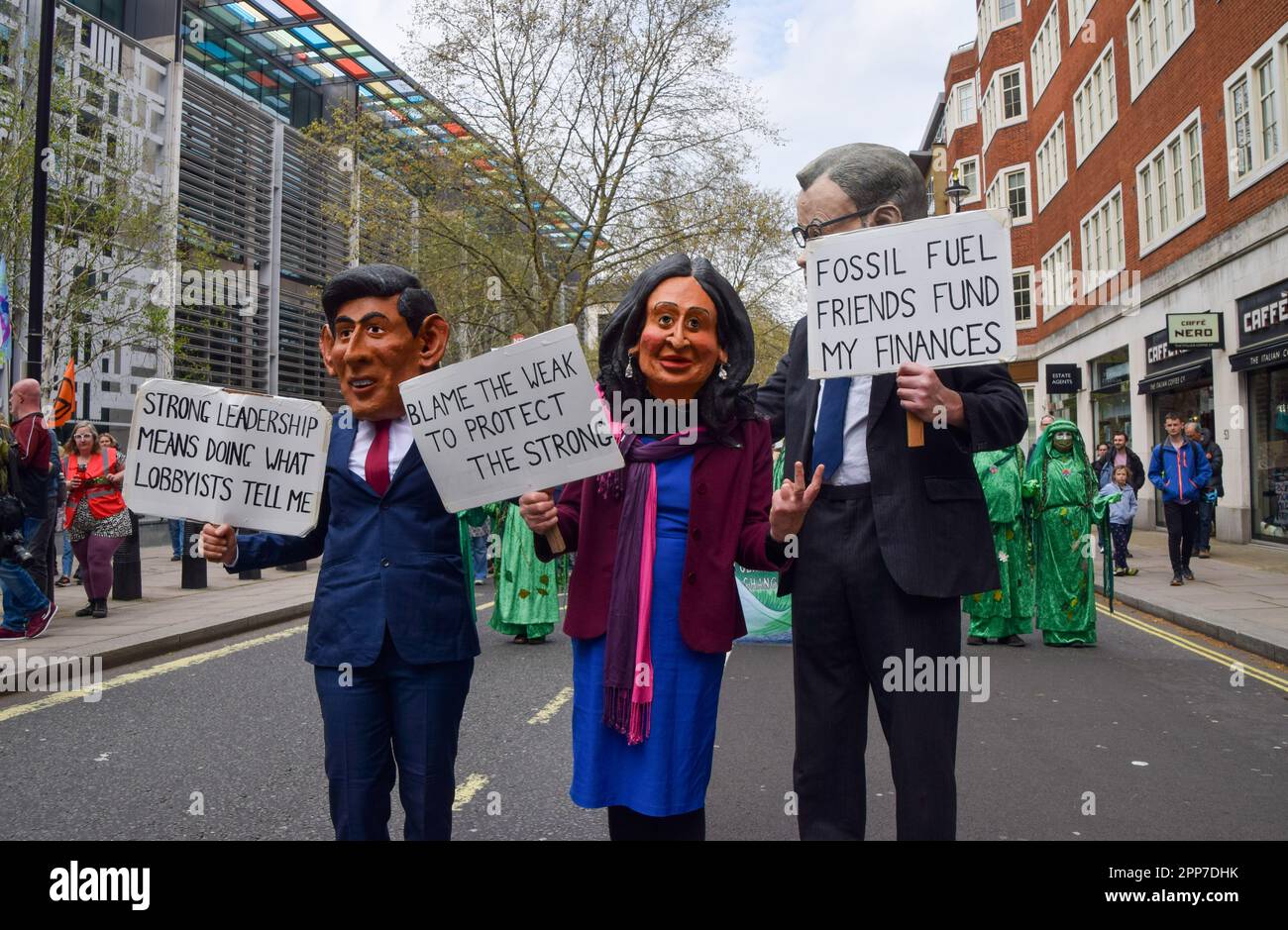 London, England, UK. 22nd Apr, 2023. Protesters wearing masks of Rishi ...
