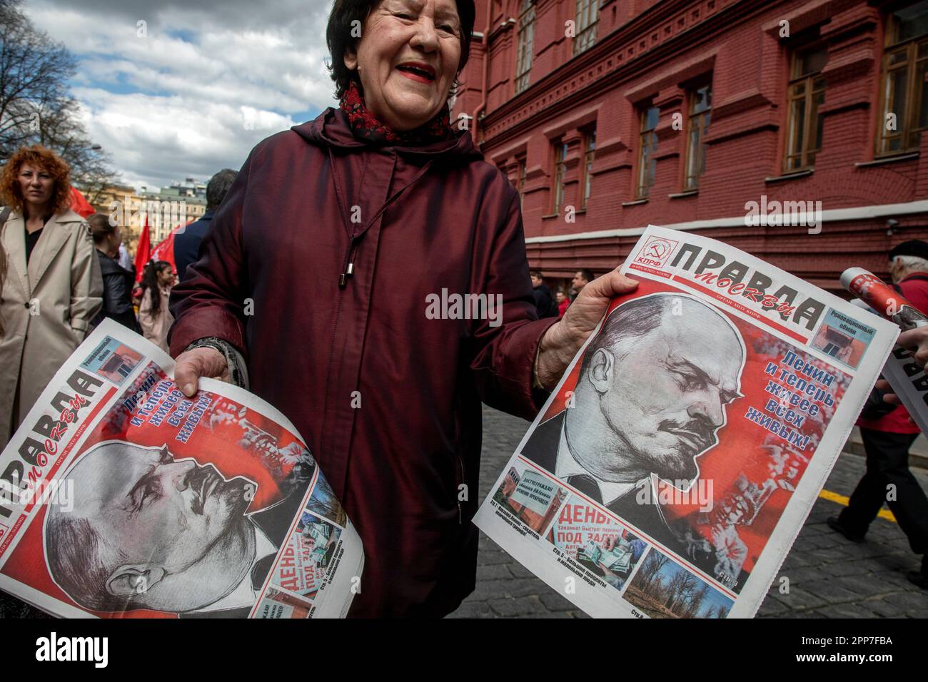 Moscow, Russia. 22nd of April, 2023. An elderly woman holds a communist ...