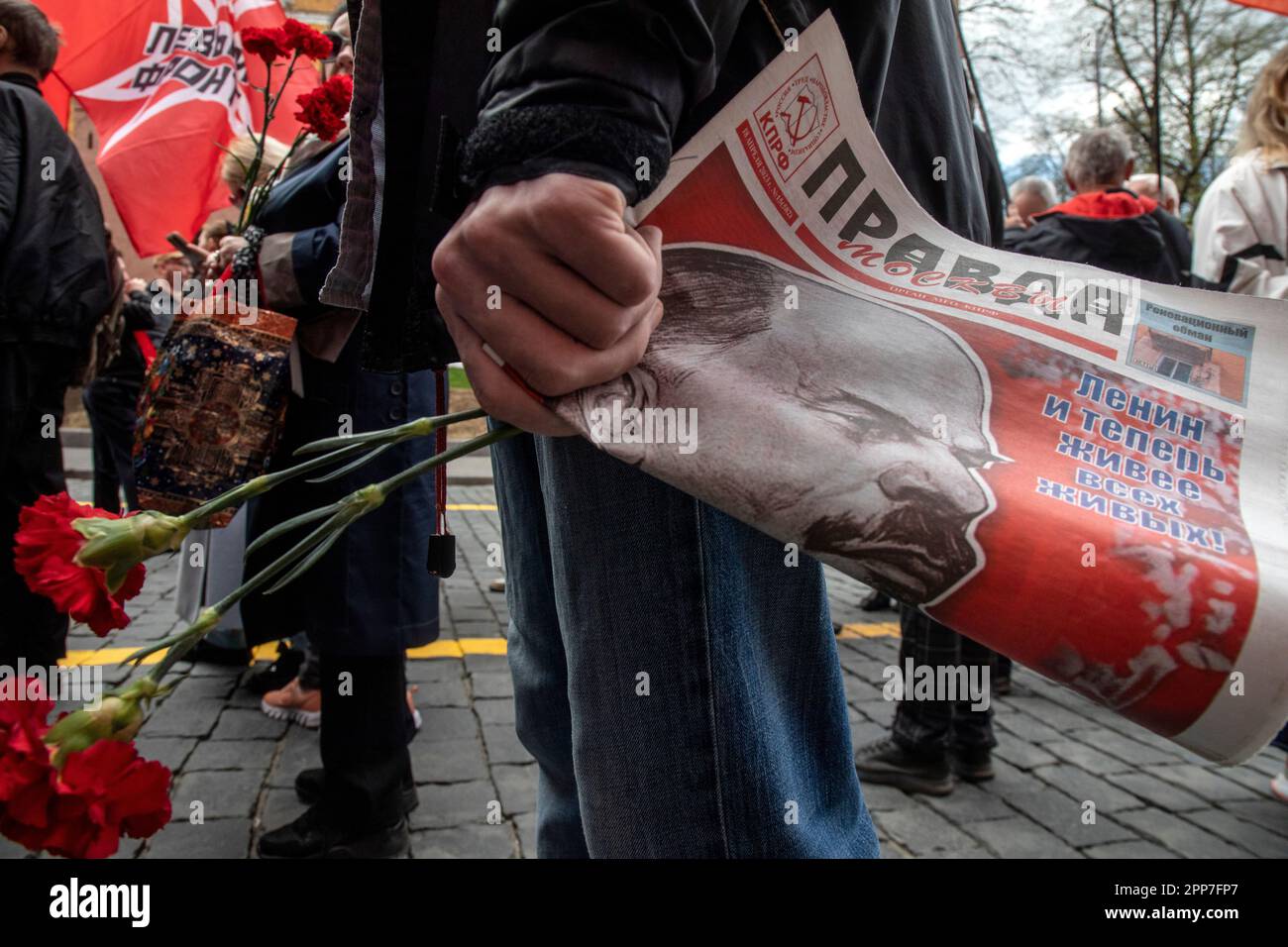 Moscow, Russia. 22nd of April, 2023. A man holds a communist party's ...