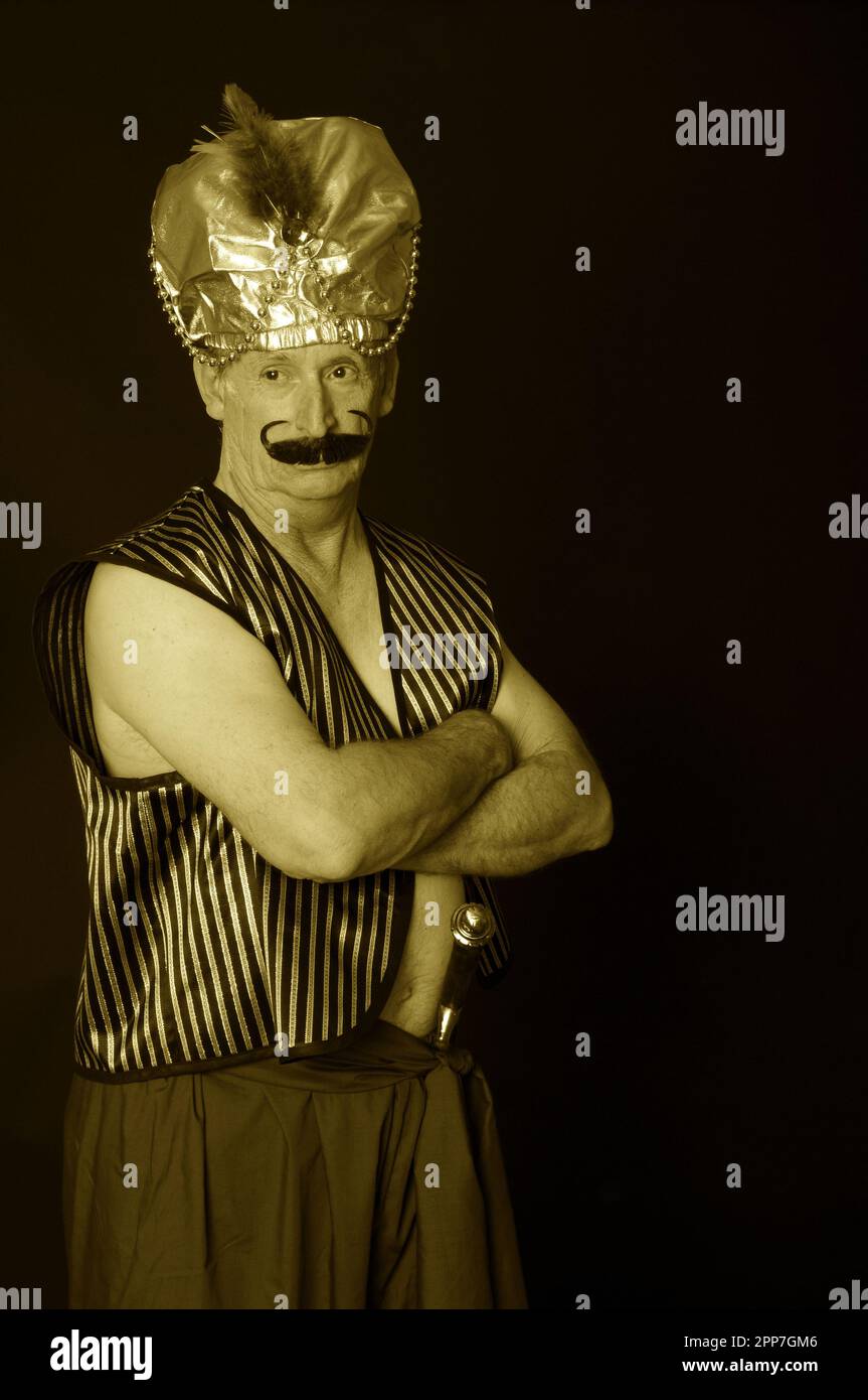 An elder sultan or shiek isolated over black Stock Photo - Alamy