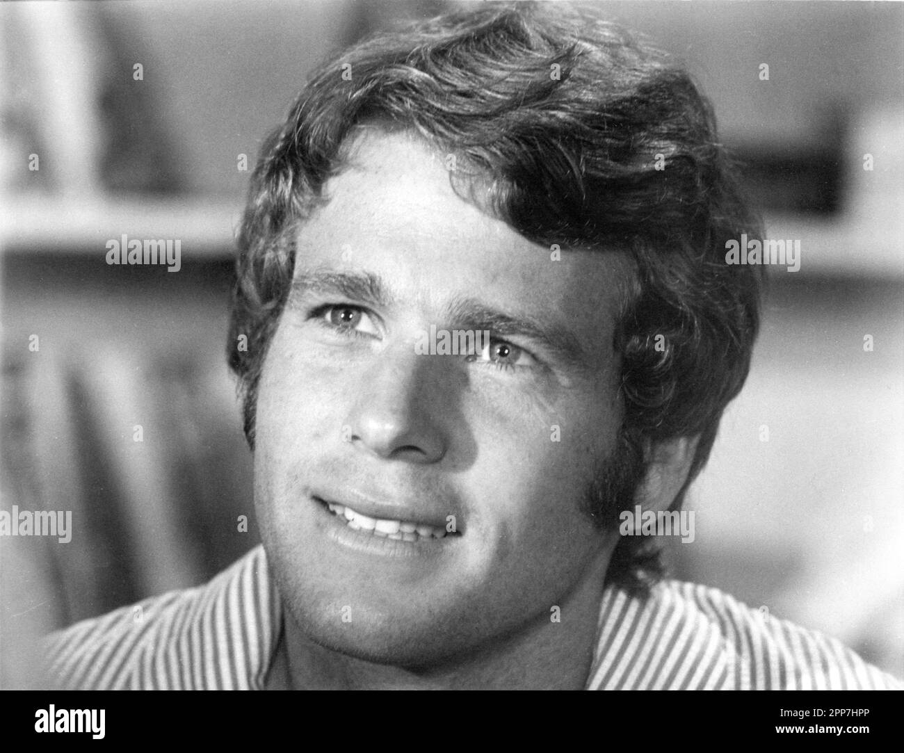 RYAN O'NEAL portrait in THE THIEF WHO CAME TO DINNER 1973 director BUD ...