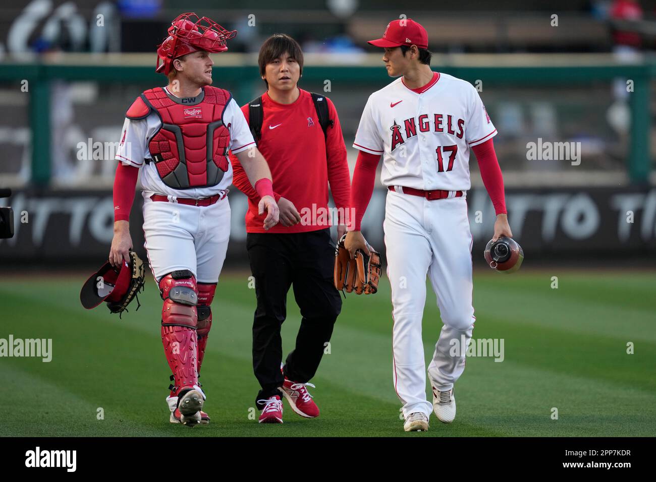 Los Angeles Angels catcher Chad Wallach (35), interpreter Ippei ...