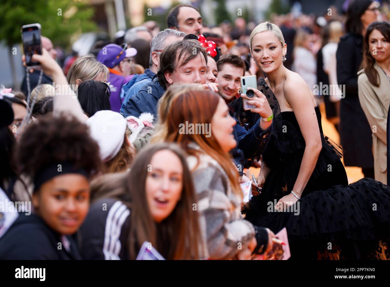 Actor Pom Klementieff takes a selfie with fans the gala event for the ...