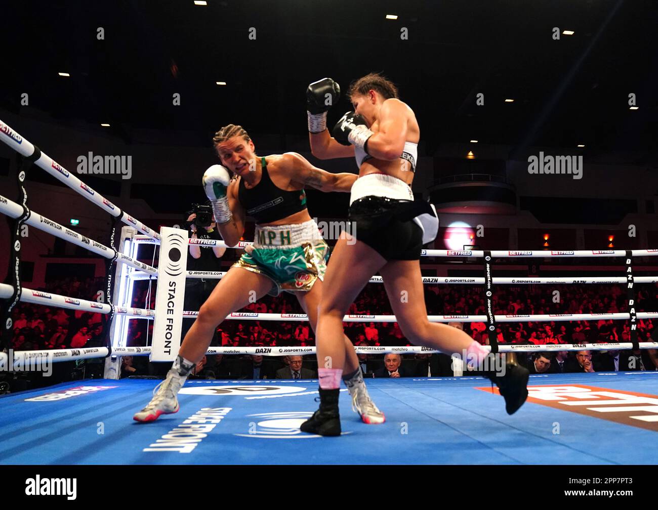 Sandy Ryan (right) and Marie Pier Houle in the WBO World Welter weight bout at Cardiff ...