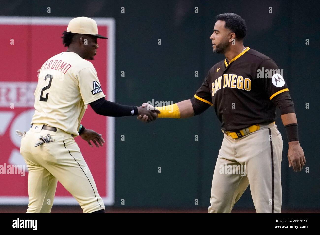 Arizona Diamondbacks' Geraldo Perdomo, left, greets Nelson Cruz before ...