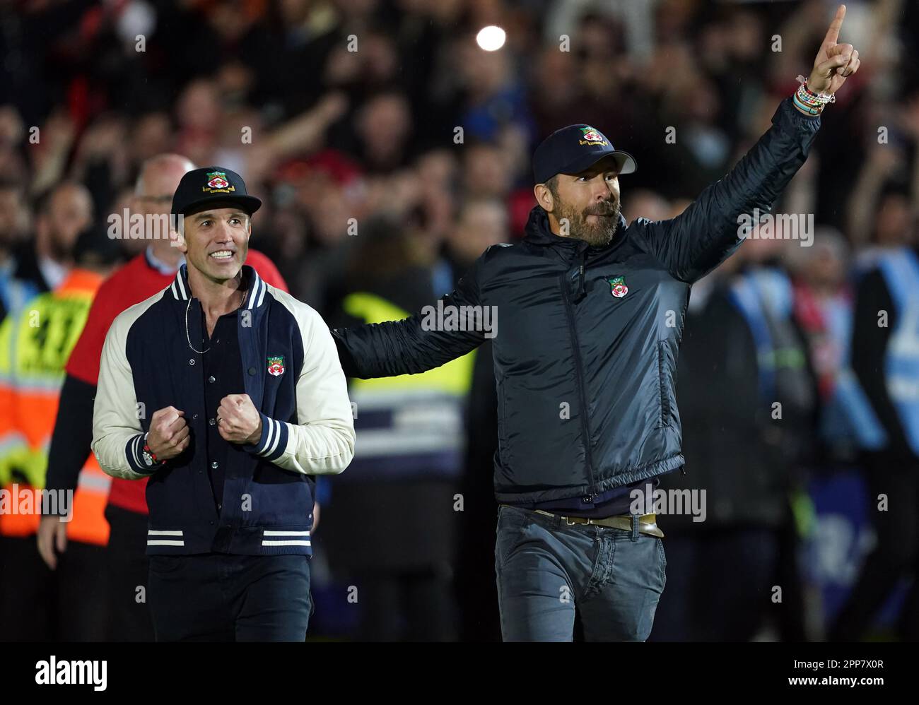 Wrexham co-owners Rob McElhenney and Ryan Reynolds celebrate following ...