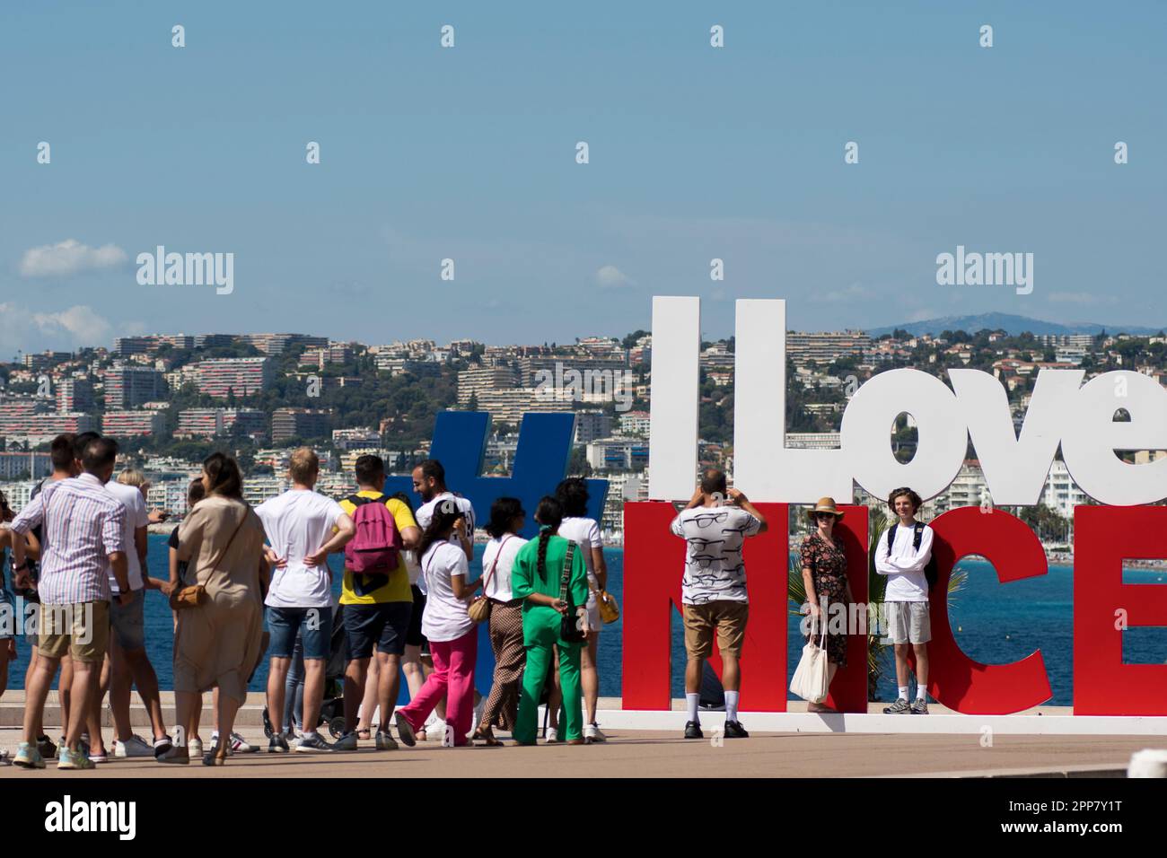 Tourists queuing to have their photo taken in front of "I Love Nice ...