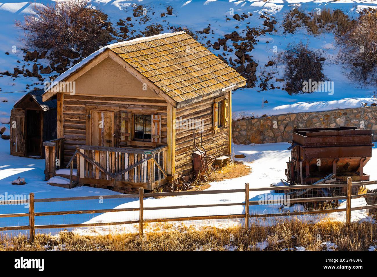 A gold miner's log cabin in the Colorado Rocky Mountains with a split ...