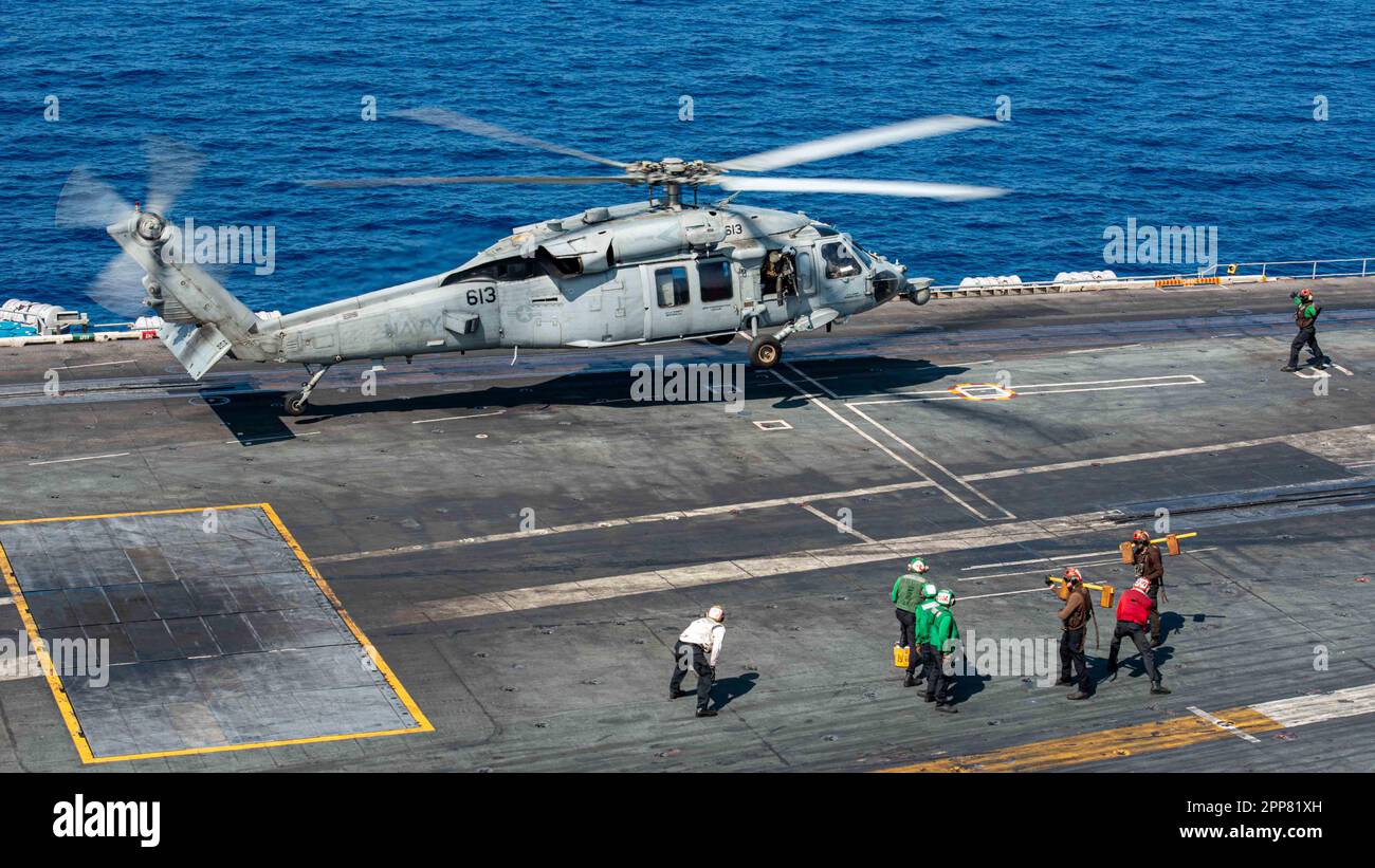 230421-N-NX635-1032 SOUTH CHINA SEA (April 21, 2023) An MH-60S Sea Hawk ...