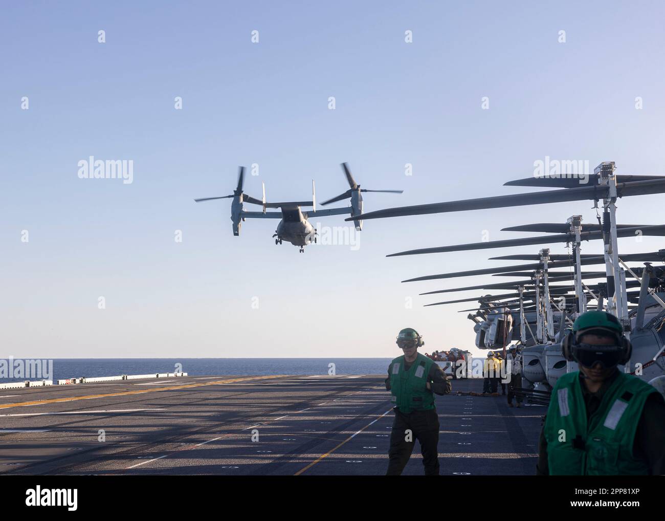 An MV-22 Osprey assigned to the 26th Marine Expeditionary Unit takes off from the Wasp-class ...