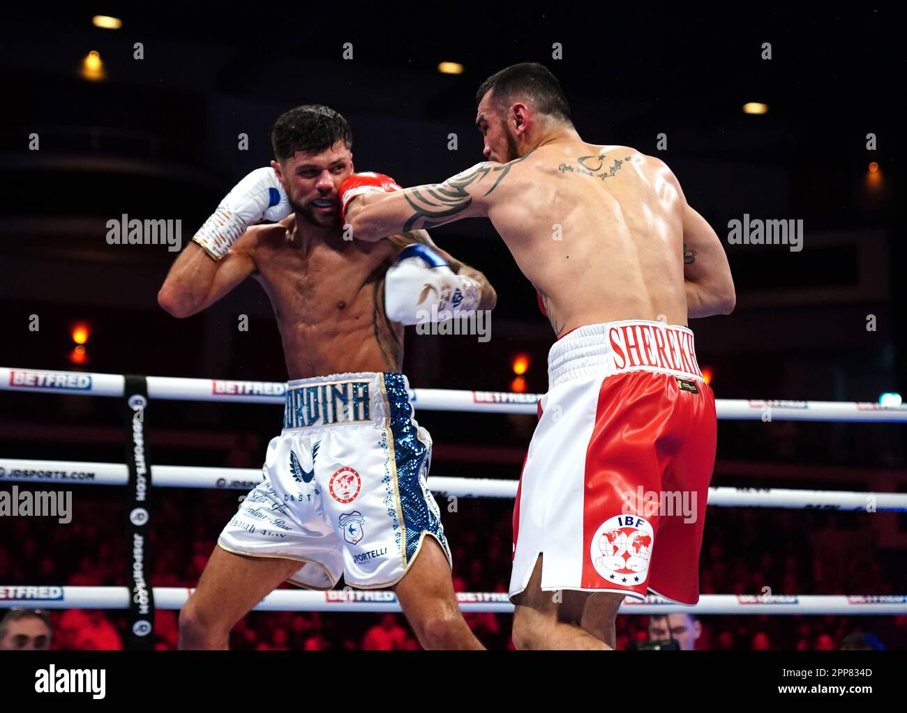 Joe Cordina (left) and Shavkatdzhon Rakhimov in the IBF World Super ...