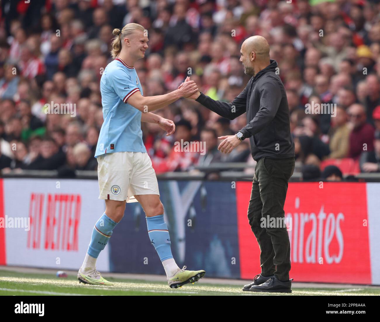 London, UK. 22nd Apr, 2023. Erling Haaland (MC) and Pep Guardiola (Man ...