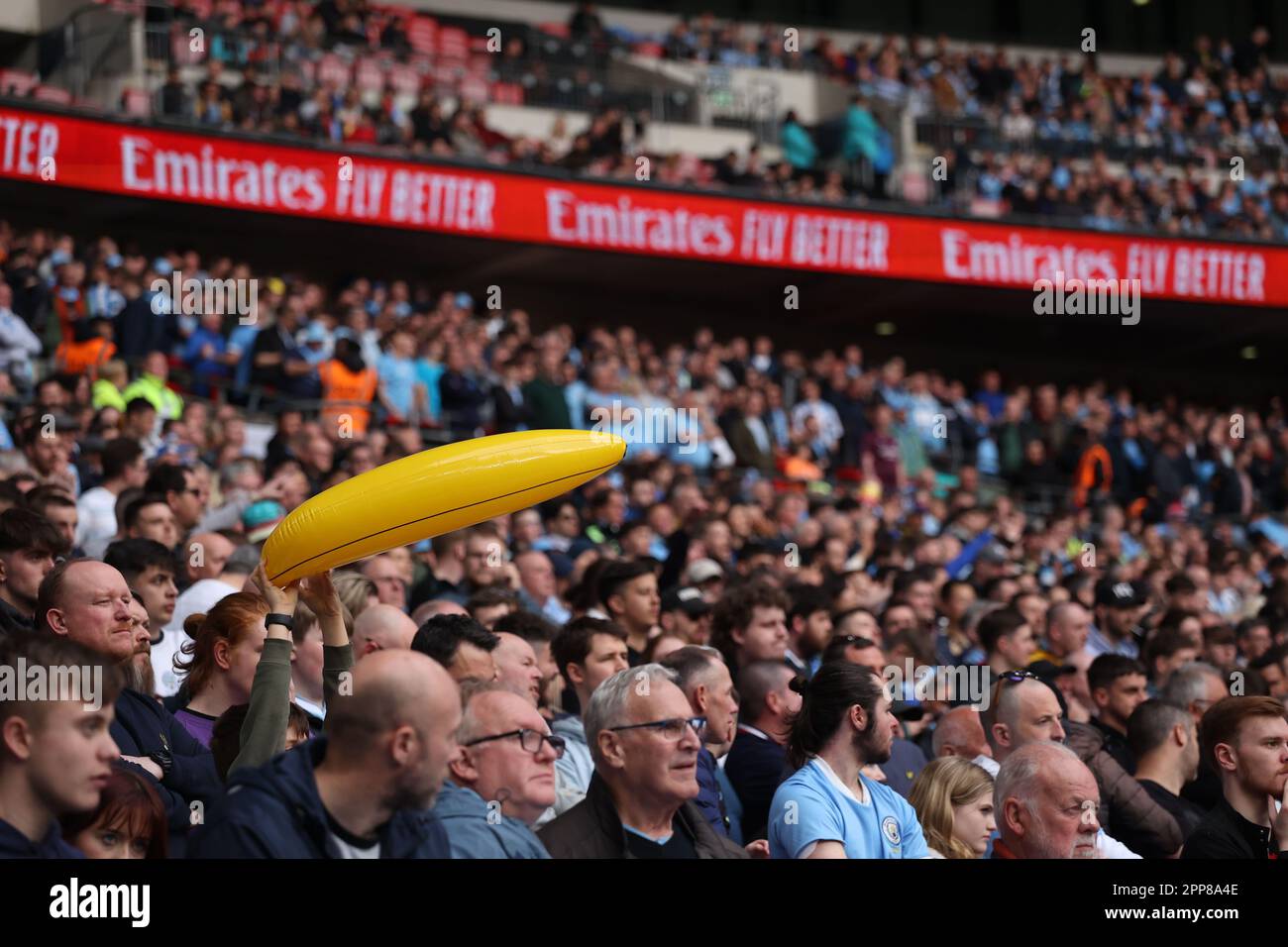 London, UK. 22nd Apr, 2023. A Man City fan holds up an inflatable ...