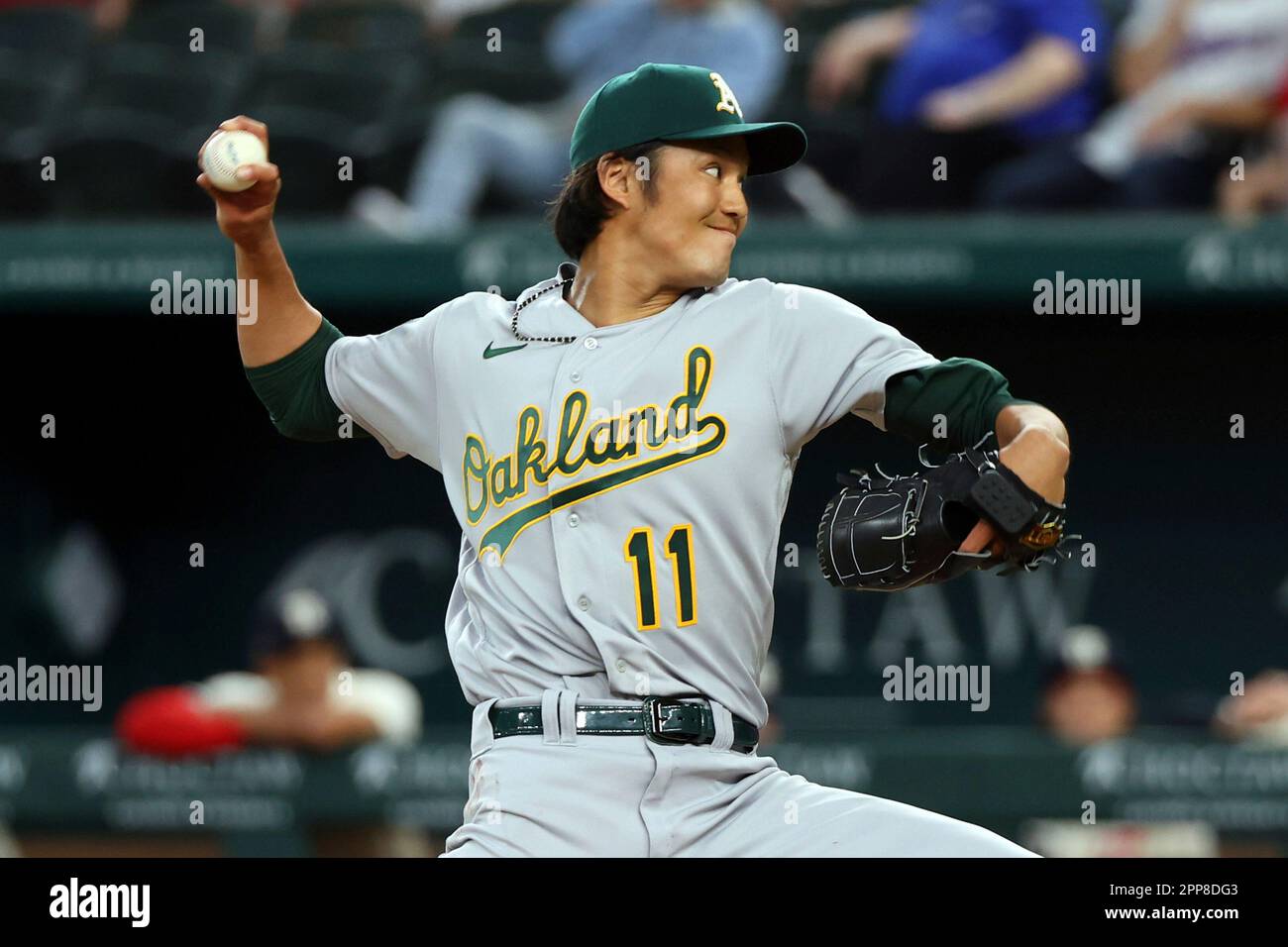 Oakland Athletics starting pitcher Shintaro Fujinami (11) delivers in ...