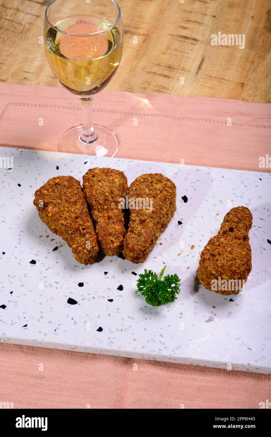 Tasty vegetarian vegan meat free chicken thighs, healthy food close up ...