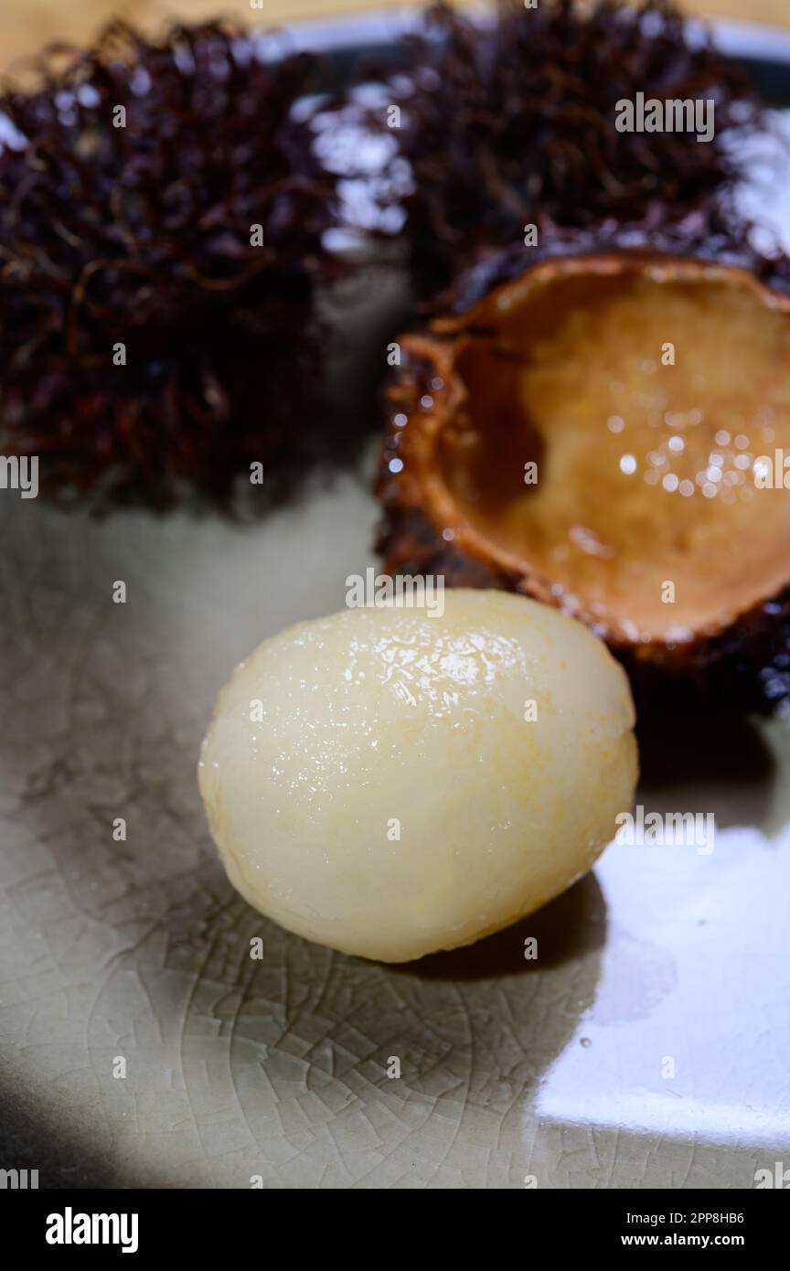 Unpeeled rambutan hi-res stock photography and images - Alamy