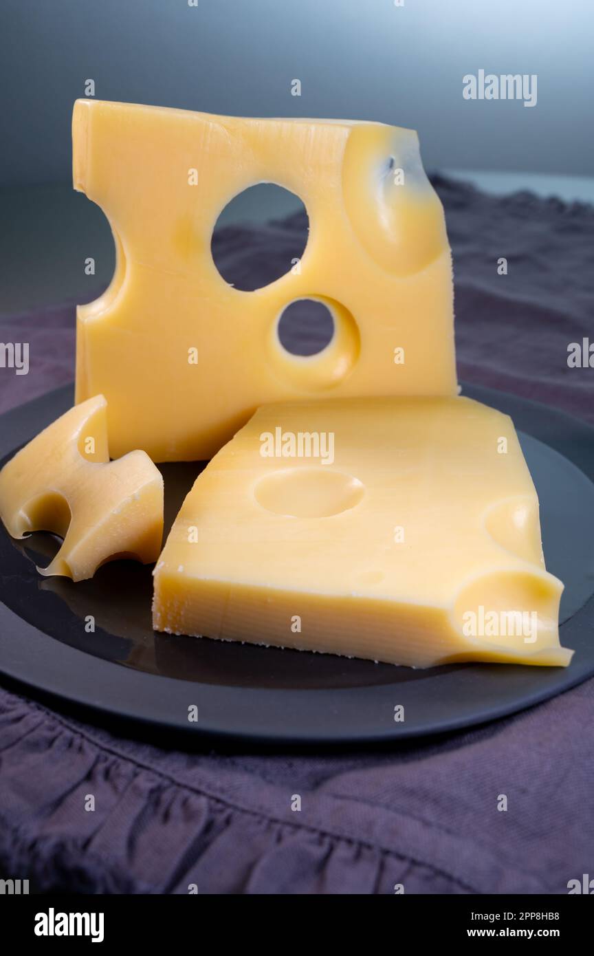 Swiss cheese collection, yellow emmentaler or emmental cheese with ...