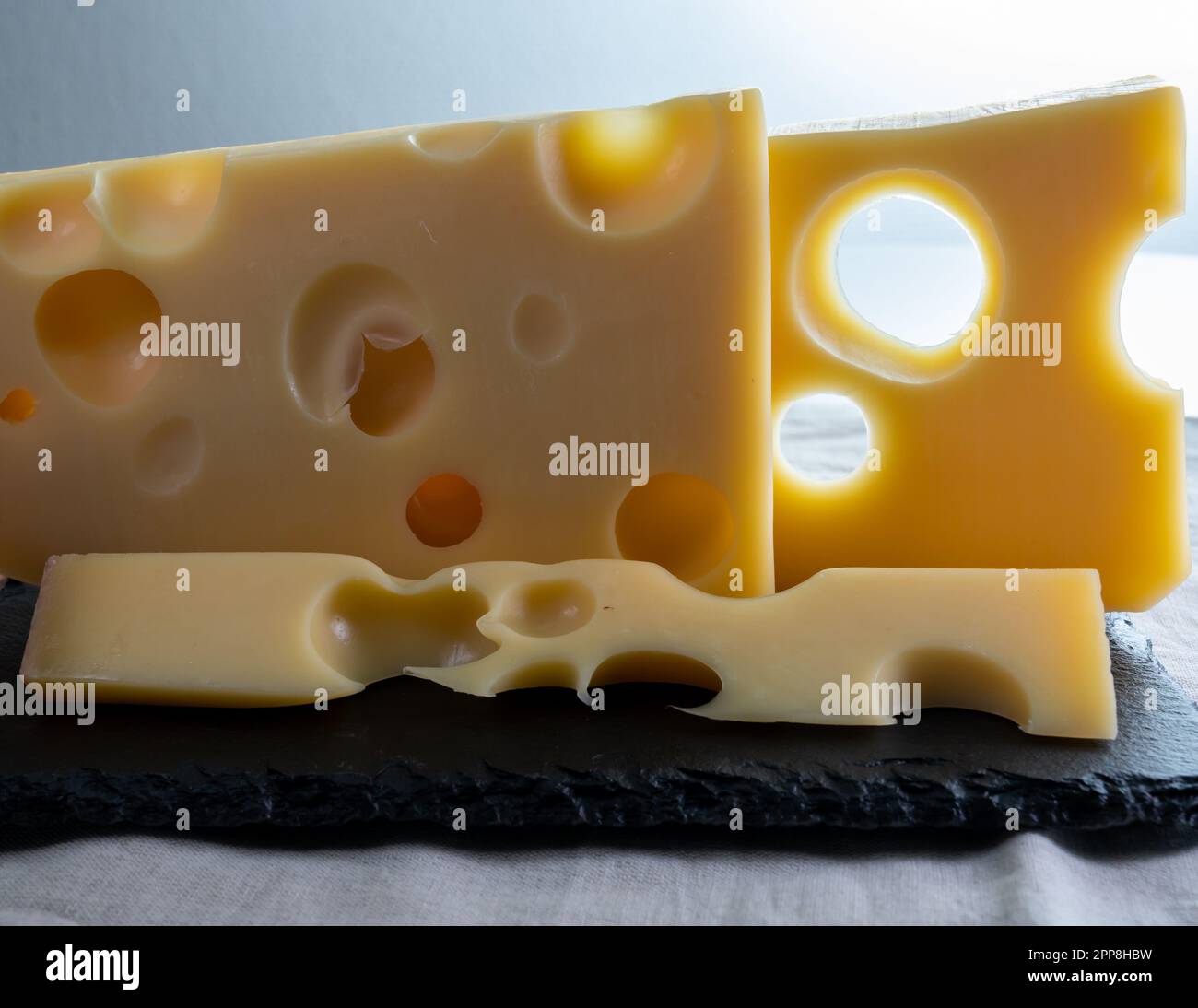 Swiss cheese collection, yellow emmentaler or emmental cheese with ...