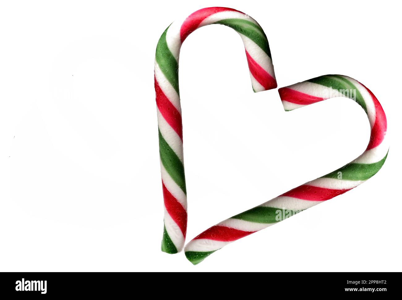 Two colorful candy sticks canes bent on top which together form the ...