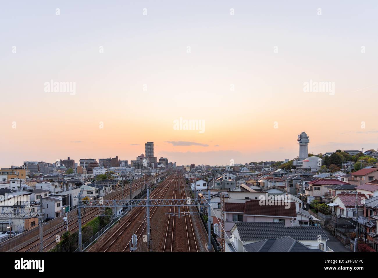 Akashi, Japan - April 19, 2023: Sunset on train tracks through ...
