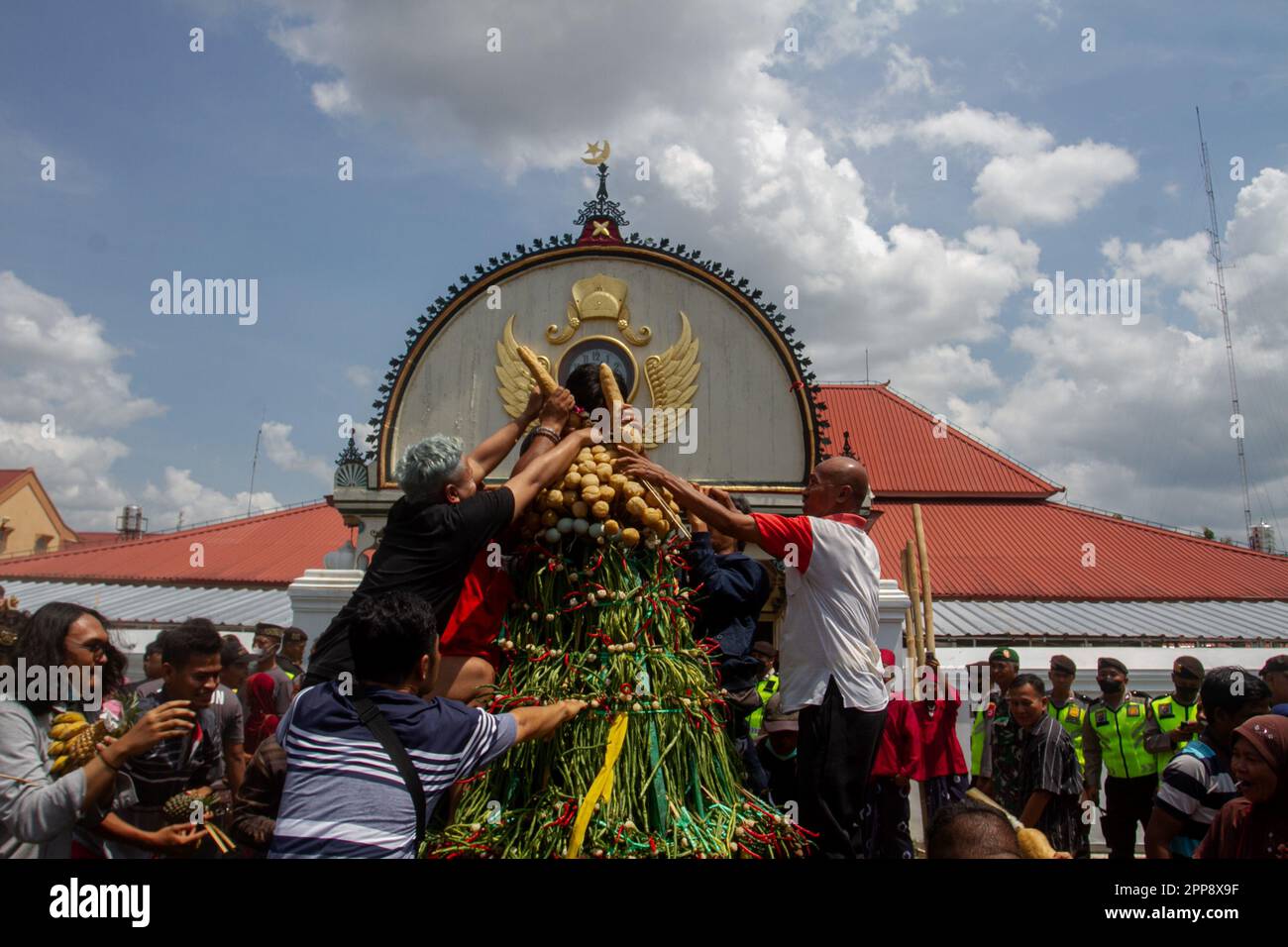 Yogyakarta, Indonesia. 22nd Apr, 2023. People scramble to get 'Gunungan ...