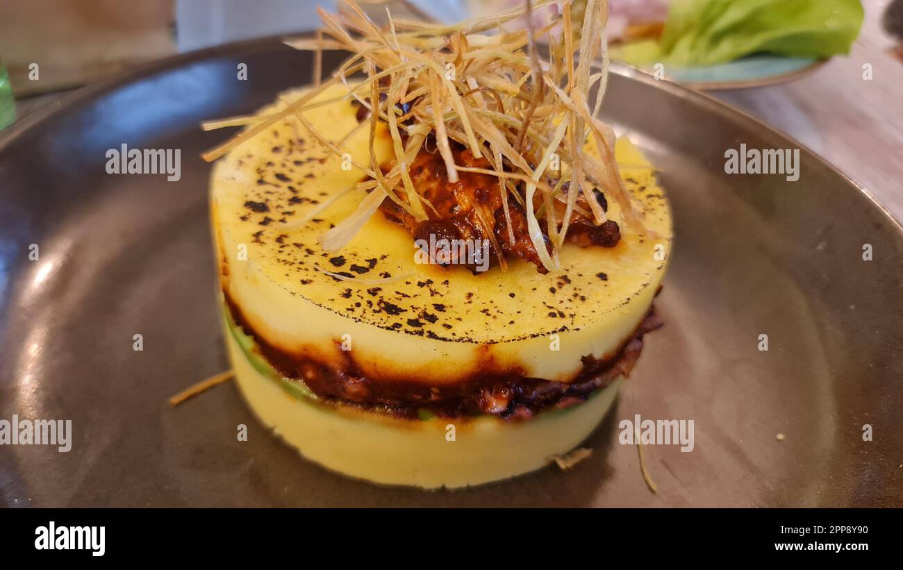 Causa Limena is a traditional Peruvian dish that consists of layered ...